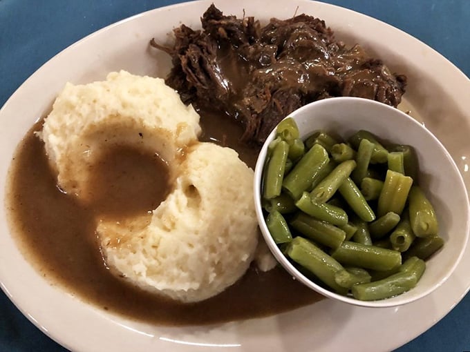 Fork-tender roast beef swimming in homemade gravy with cloud-like mashed potatoes. Comfort food that makes you want to call your mother and apologize for ever leaving home.