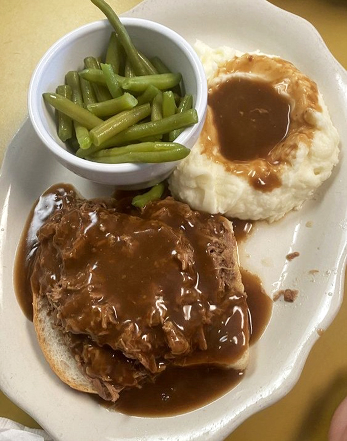 This isn't just roast beef—it's a sermon on gravy. The kind that makes you want to start a religion where this sandwich is the holy text.