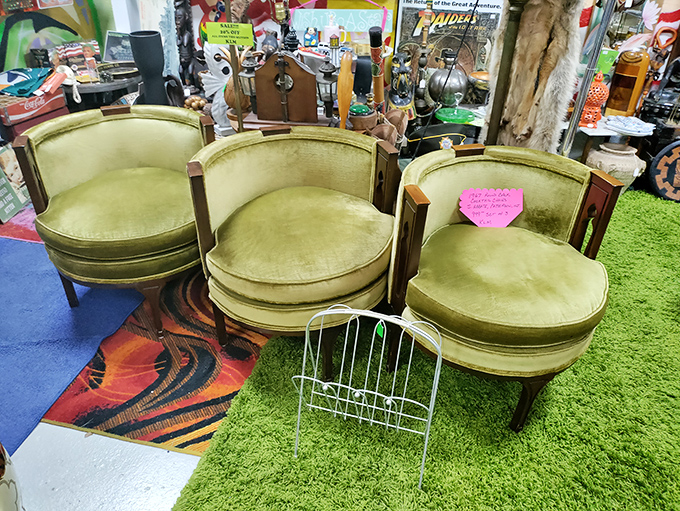 These avocado velvet barrel chairs aren't just furniture – they're time machines to cocktail parties where fondue was the height of sophistication.