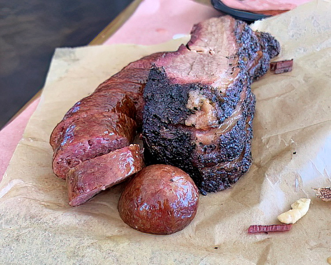 Brisket with that coveted smoke ring and sausage that snaps when you bite it&mdash;this plate is the barbecue equivalent of winning the lottery.