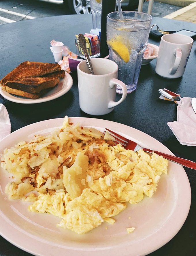Fluffy scrambled perfection meets those legendary crispy home fries that locals can't stop raving about.