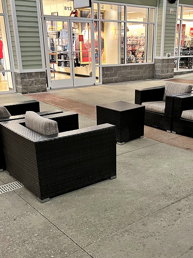 Strategic rest zones with comfortable seating offer shoppers a moment to contemplate their next retail conquest or simply rest weary bargain-hunting feet.