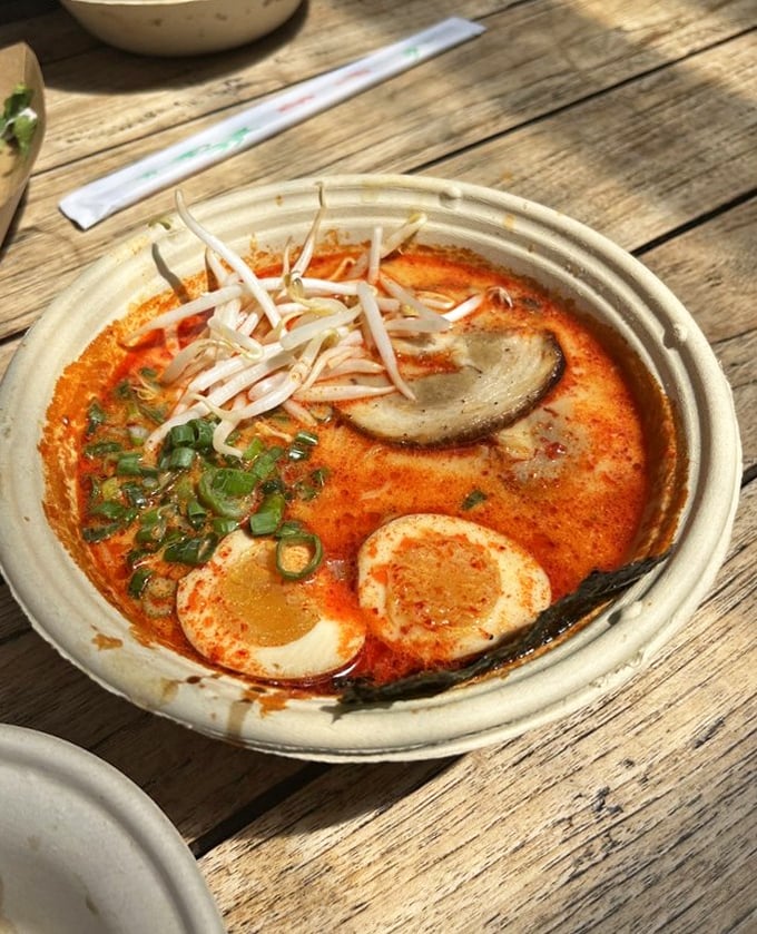 This fiery ramen isn't messing around. The vibrant broth, those perfectly halved eggs, and fresh sprouts create the kind of bowl you'll dream about at random moments.