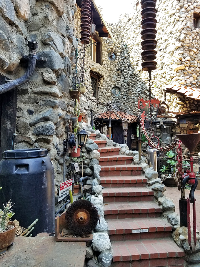 Stairway to whimsy! Every step in Rubel Castle tells a story, with industrial artifacts and stone work creating a fantastical vertical journey.