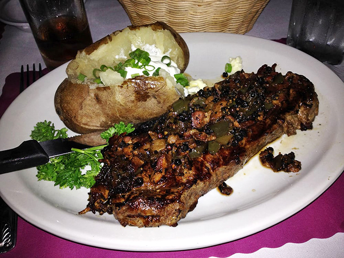 Char marks like a roadmap to flavor town. This steak and loaded baked potato combo is the comfort food equivalent of a warm hug.
