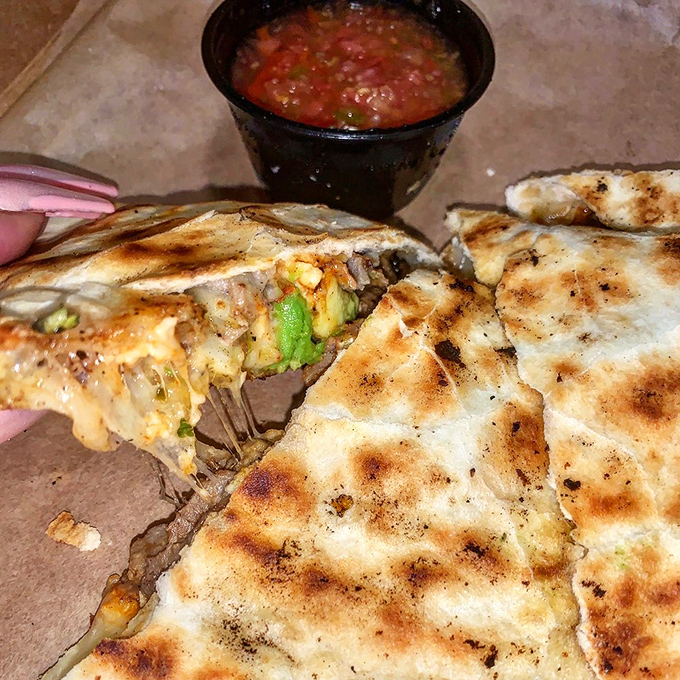 Behold the legendary quesadilla in all its glory &ndash; perfectly crisped tortilla giving way to a molten interior that creates those cheese pulls worthy of a slow-motion video.