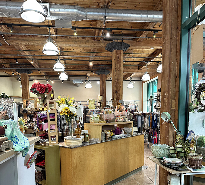 Exposed wooden beams and thoughtful displays transform secondhand shopping into a high-end retail experience without the high-end prices.