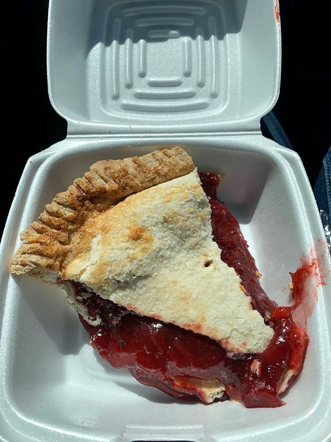 This isn't just strawberry pie &ndash; it's summer captured in a flaky crust, the kind of dessert that makes you contemplate ordering a second slice before finishing the first.