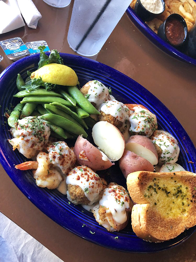 Stuffed shrimp that look like they're wearing little white tuxedos. The snap peas add color, but those potatoes are the unsung heroes.iu