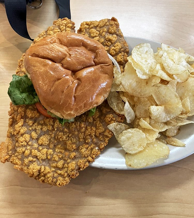 The tenderloin sandwich here isn't just bigger than the bun&mdash;it's practically staging a delicious rebellion against the concept of bread-to-meat ratio.