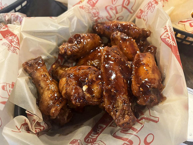 These wings aren't just cooked&mdash;they're transformed. Glistening with sauce that promises to leave memories on your taste buds and napkins.