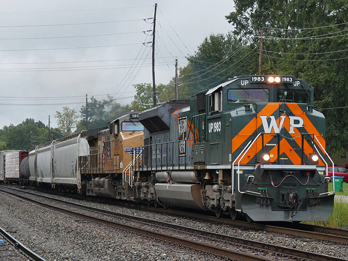 The railroad tracks that built this town still whisper tales of commerce and dreams rolling through.