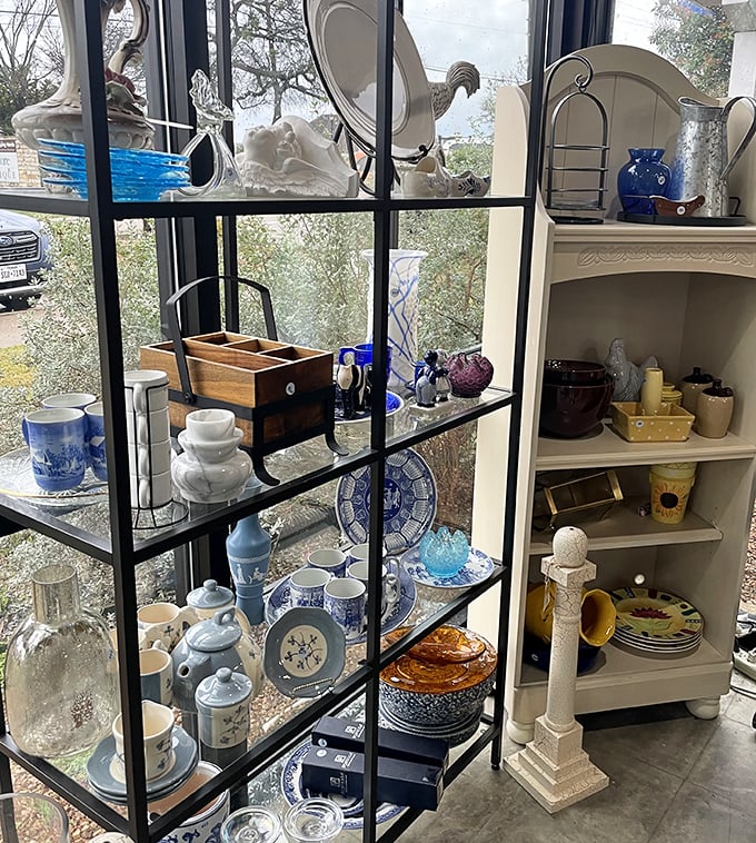 Blue and white pottery heaven! This display could make Marie Kondo weep with joy&mdash;everything sparks joy and has its perfect place.