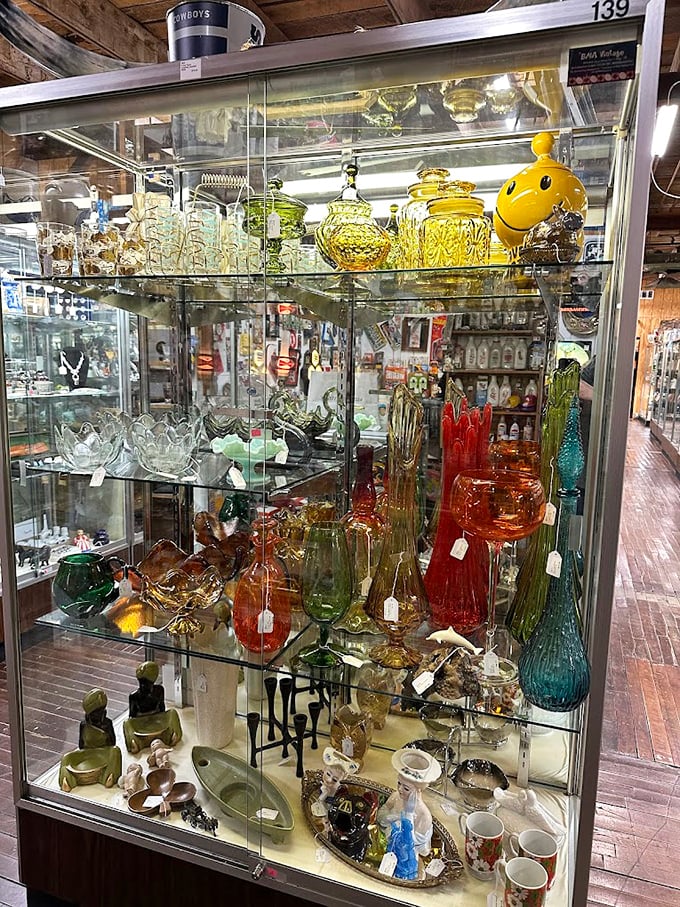 Glass treasures catching light like liquid jewels. From Depression-era collectibles to mid-century marvels, each piece tells a story of American craftsmanship.