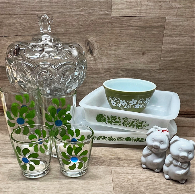 Vintage Pyrex and porcelain figurines await new homes. Like finding the missing puzzle pieces to your grandmother's kitchen, these treasures spark instant joy.