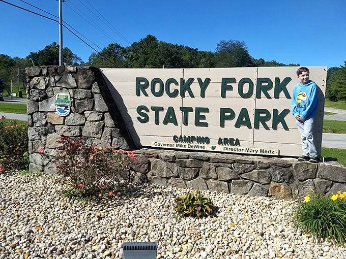 The entrance sign welcomes visitors with rustic charm, standing as the gateway to adventures that await beyond.