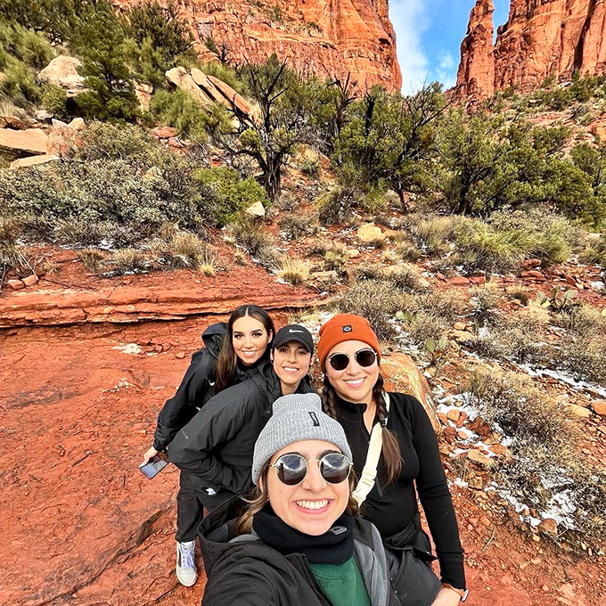 Friends making memories against a backdrop that makes everyone's vacation photos look like they hired a professional photographer.