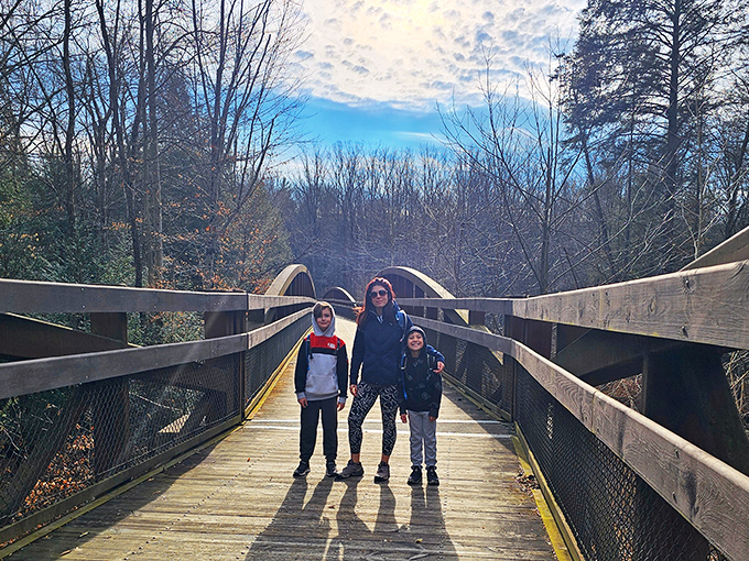 Family adventures create the best souvenirs. This wooden footbridge offers the perfect backdrop for those "remember when" stories that'll surface decades later.