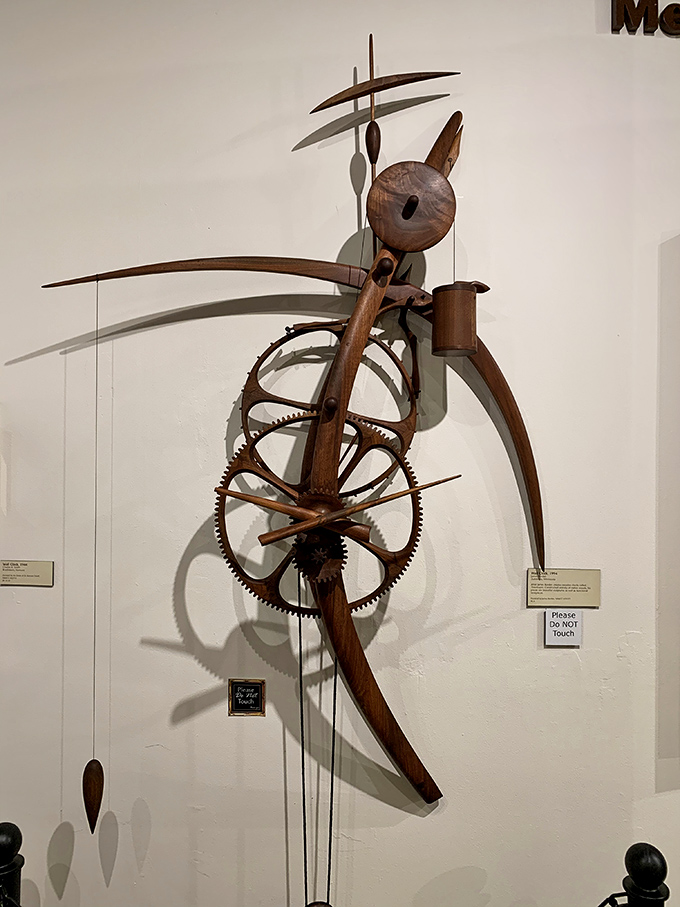 Not your average wall art! This sculptural wooden timepiece looks like what would happen if Salvador Dalí designed a clock after a particularly inspiring dream.