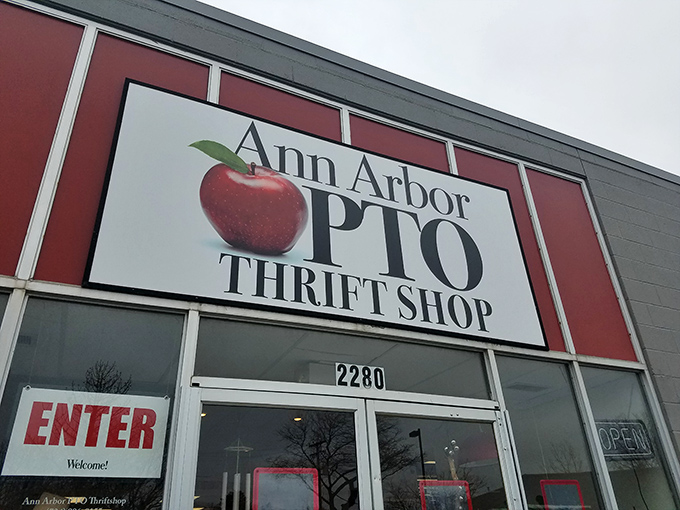 The iconic apple logo of Ann Arbor PTO Thrift Shop reminds us that shopping here is educational for your wallet.