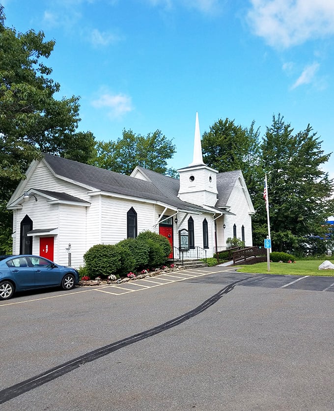 Blakeslee's little white church stands guard like a heavenly bouncer, welcoming all who seek small-town salvation.