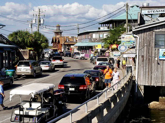 Cedar Key's main street has that "everybody knows your name" vibe, where golf carts outnumber SUVs and nobody's in a hurry.