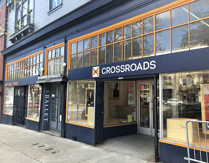 Crossroads Trading's distinctive storefront with those gorgeous yellow-trimmed windows practically screams "fashion finds inside!"