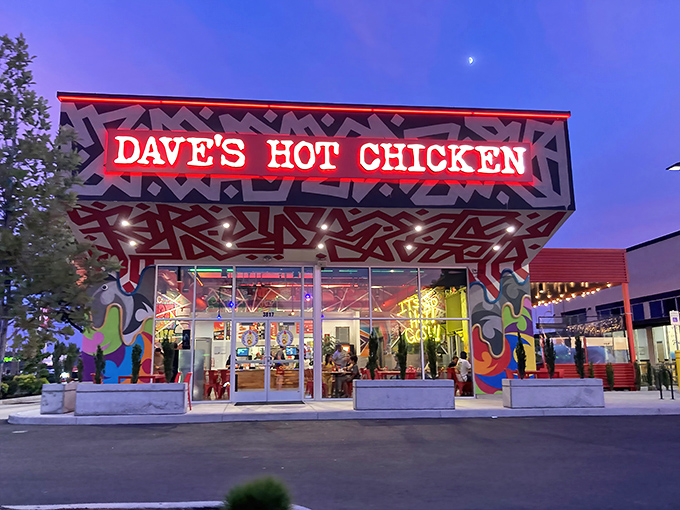 Dave's Hot Chicken lights up the night with its wild patterns and colors &ndash; a Nashville heat wave in Salem's food scene.