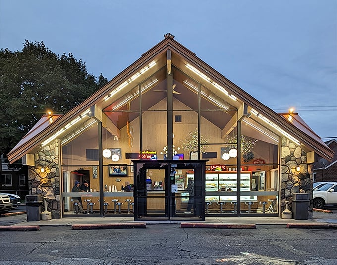 Donutville's A-frame design isn't just architecture &ndash; it's a cathedral dedicated to the religion of perfectly fried dough.