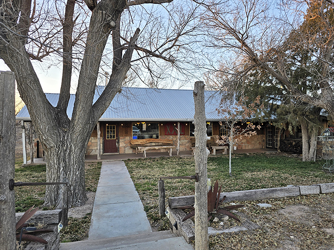 This rustic stone cabin looks like it was built by pioneers who knew the importance of a good steak after a hard day's work.