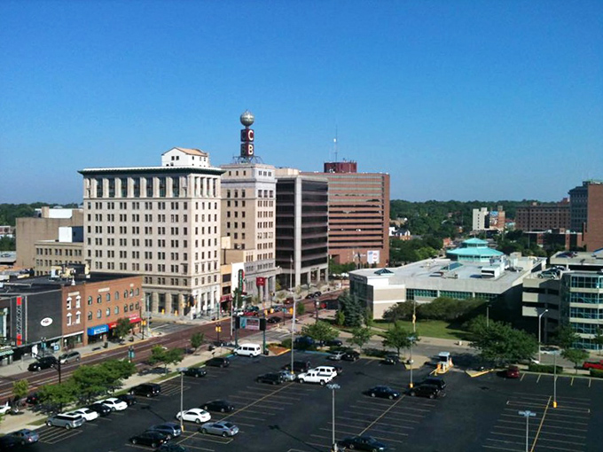 Flint's iconic "Vehicle City" arch stands as a proud reminder of automotive heritage that shaped both the town and America.