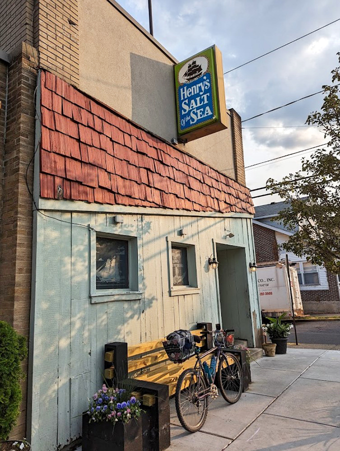 Henry's Salt of the Sea looks like a fisherman's cottage that took a wrong turn at the Atlantic. That weathered charm speaks volumes!