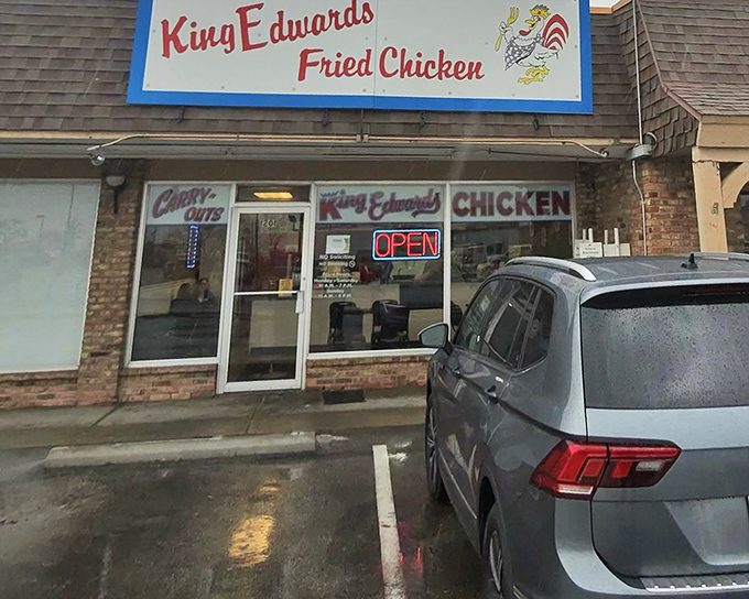 King Edwards' retro sign beckons chicken lovers like a beacon of crispy hope in a sea of fast-food mediocrity.