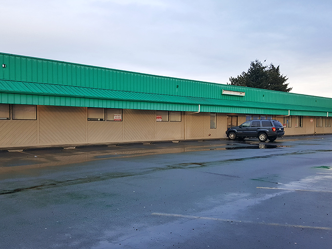Don't judge a flea market by its cover! Behind this unassuming green roof lies a wonderland of potential treasures.