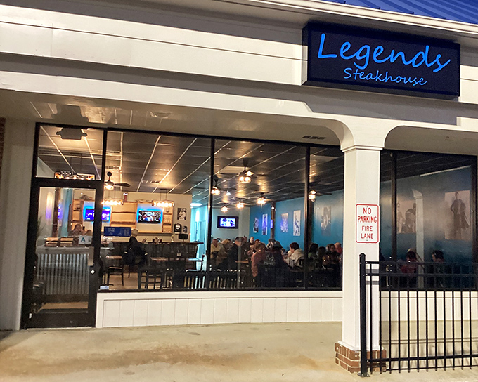 Behind that blue neon glow awaits a casual atmosphere where sports fans and steak lovers find common ground.