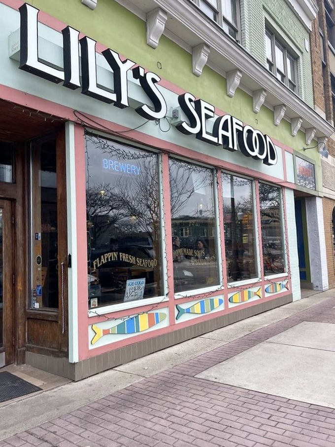 Lily's pink-and-green facade pops against the cityscape &ndash; as colorful as the seafood creations waiting inside.