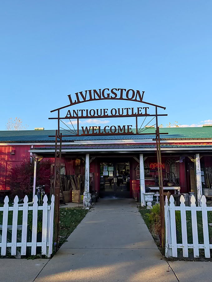 Livingston Antique Outlet's barn-red exterior and welcoming arch practically shout "Come in and stay awhile!" That white picket fence is just showing off.