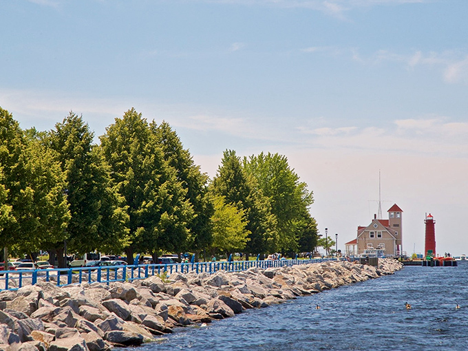 Muskegon's waterfront features a picturesque lighthouse standing guard over Lake Michigan's rocky shoreline.