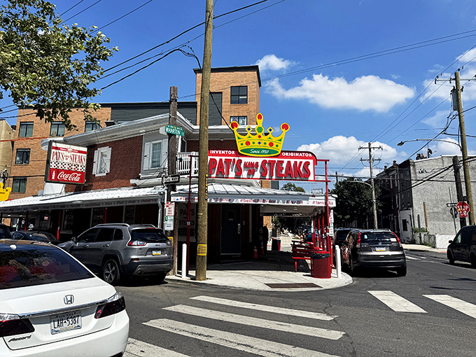 The crown says it all - Pat's iconic corner spot has ruled the cheesesteak world for generations. Sandwich royalty in its natural habitat.