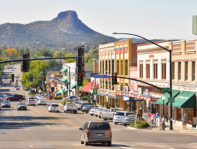 Prescott's downtown stretches beneath Thumb Butte, blending frontier charm with mountain town vibes in perfect harmony.