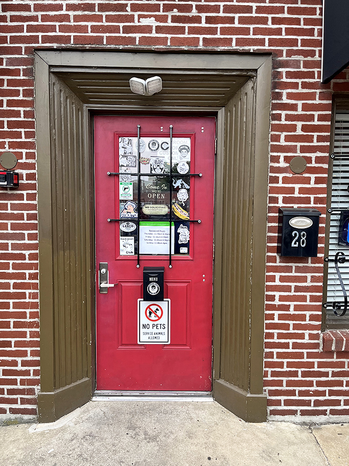 Behind this unassuming red door lies a world of smoky delights. Sometimes the best BBQ hides in plain sight!