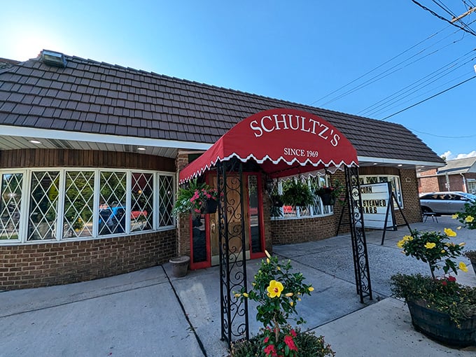 Schultz's red awning beckons like a lighthouse for the seafood-starved. Those flower pots aren't just pretty&mdash;they're saying "welcome home."