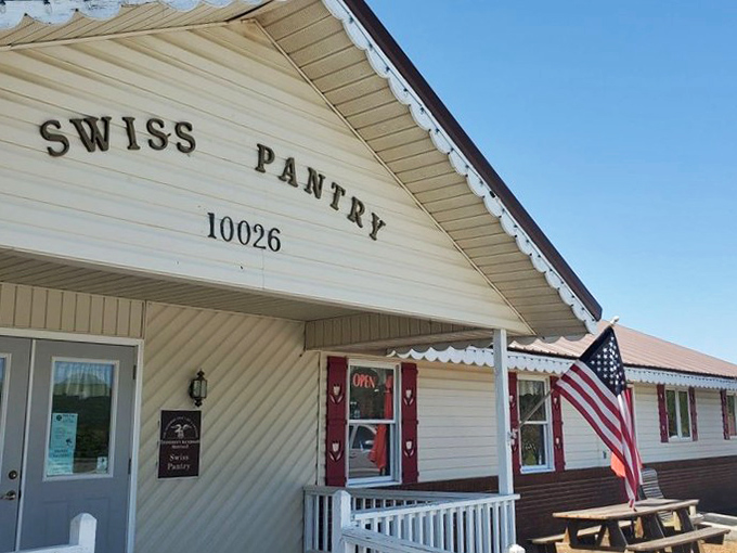 Swiss Pantry's charming cottage vibe with American flags fluttering says "welcome home" before you've even tasted their life-changing sandwiches.