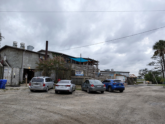 The parking lot might be gravel, but the seafood inside is pure gold. Charleston's legendary oyster haven.