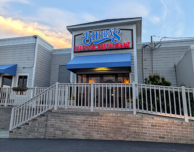 Sunset dining at its finest! Bubba's glowing sign promises crab feasts with a side of spectacular evening views.