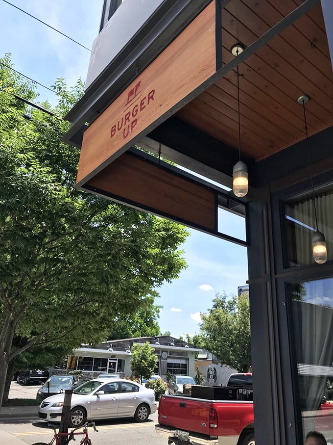 Modern minimalism meets burger maximalism at Burger Up. That wooden sign is like the quiet friend who turns out to be the most interesting person at the party.