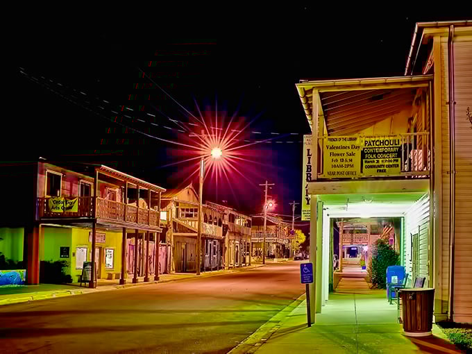 Night falls on Cedar Key's colorful storefronts, turning this fishing village into a neon-lit reminder that Florida's best spots aren't always the loudest.
