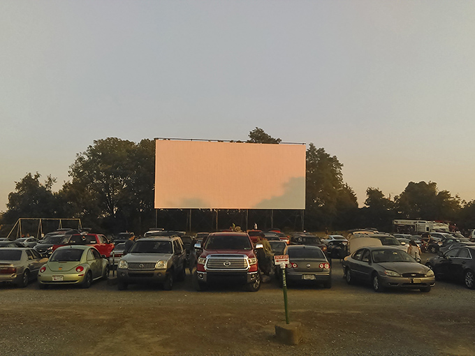 Nothing says "summer night" quite like cars parked in neat rows, waiting for movie magic under a Pennsylvania sky.