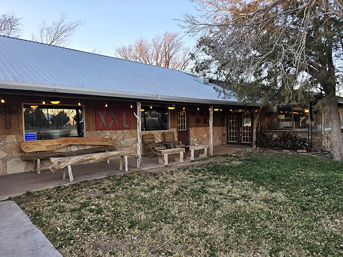 The wooden porch at Double XXL invites you to sit a spell before diving into steaks that would make a cowboy weep with joy.