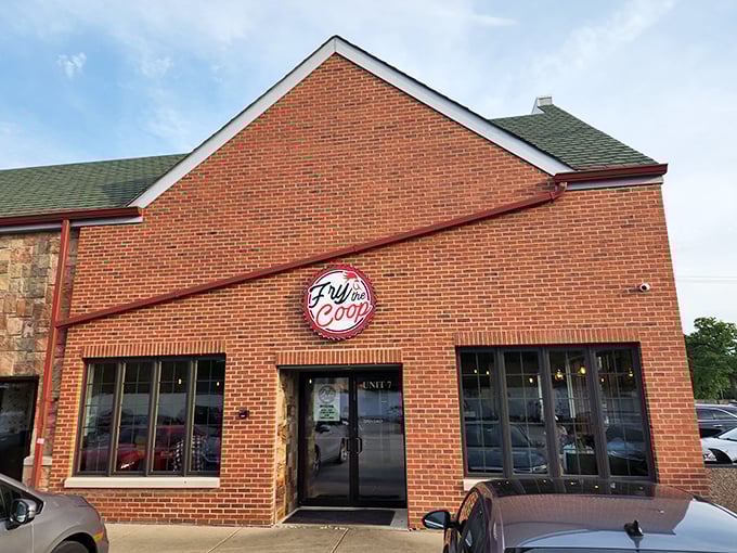 The sign promises Nashville hot chicken, but what it delivers is a religious experience disguised as dinner. Prepare those taste buds!